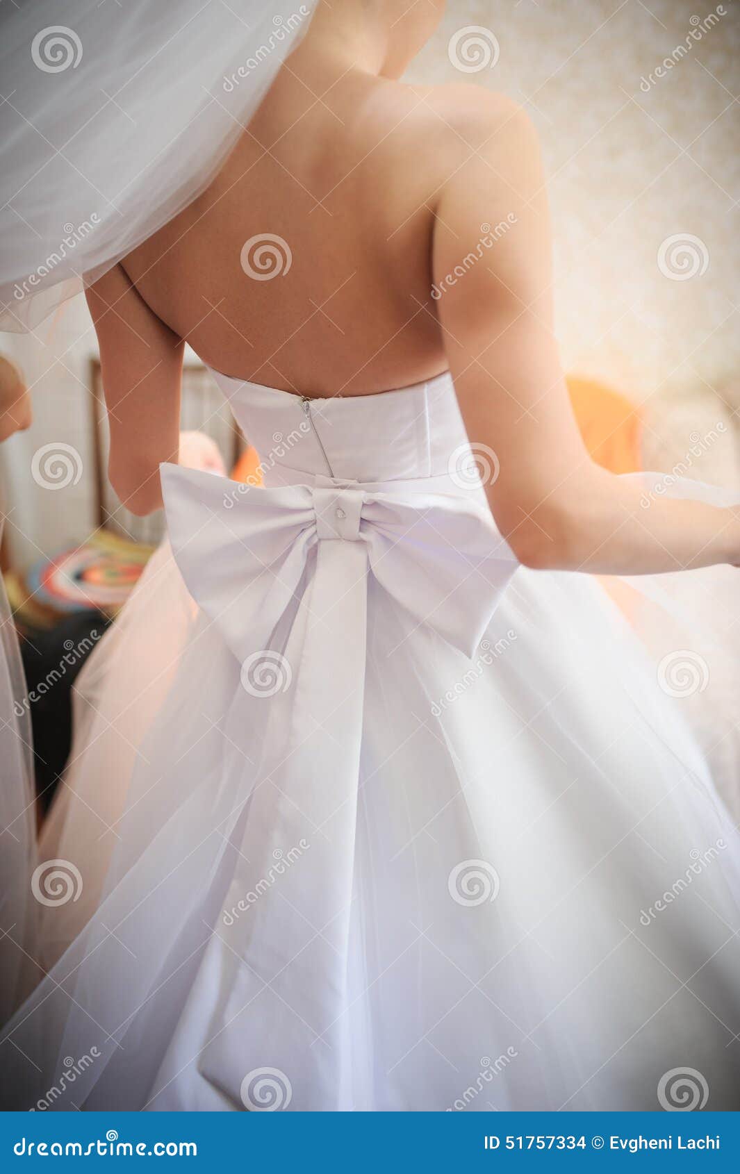 Bride getting dressed stock photo. Image of women, view - 51757334