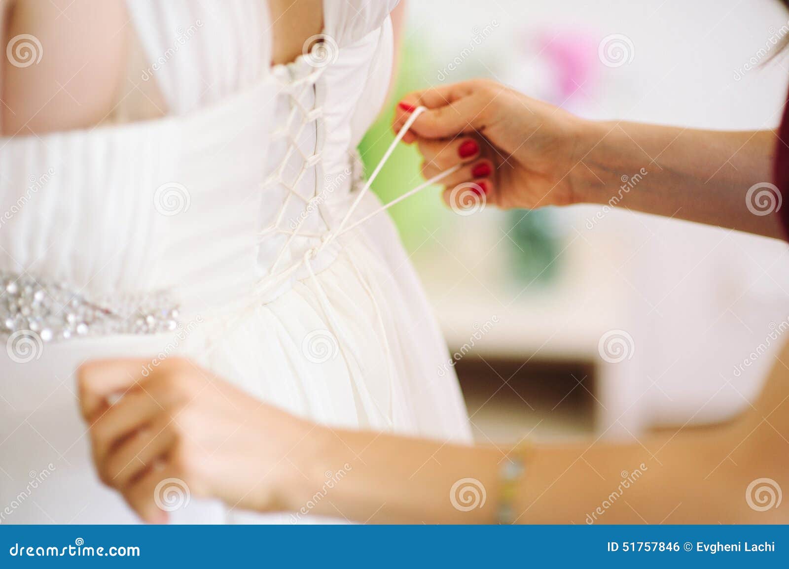Bride getting dressed stock photo. Image of caucasian - 51757846