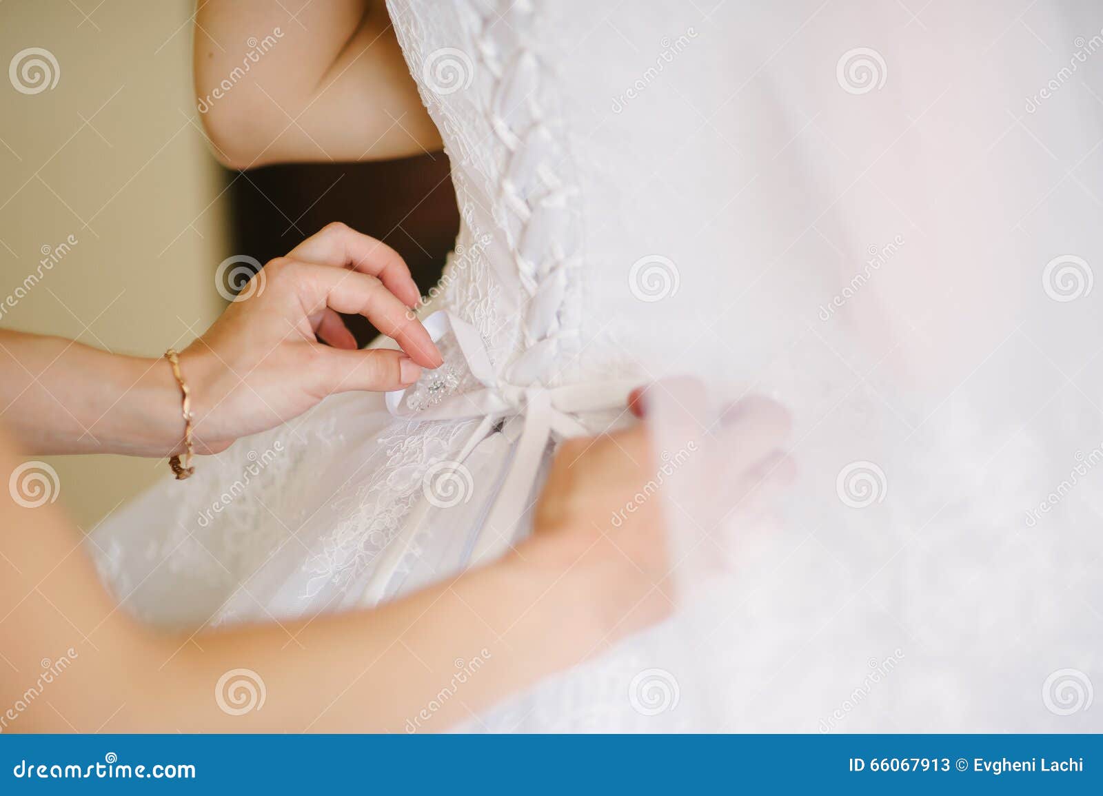 Bride getting dressed stock image. Image of pearl, bride - 66067913