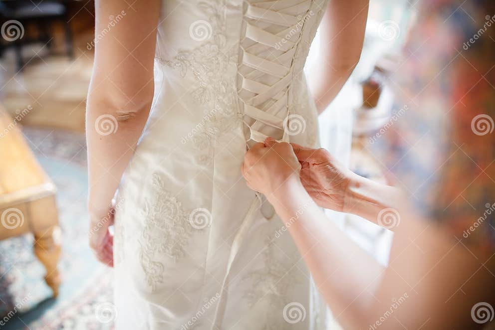 Bride getting dressed stock image. Image of white, accessory - 30181421