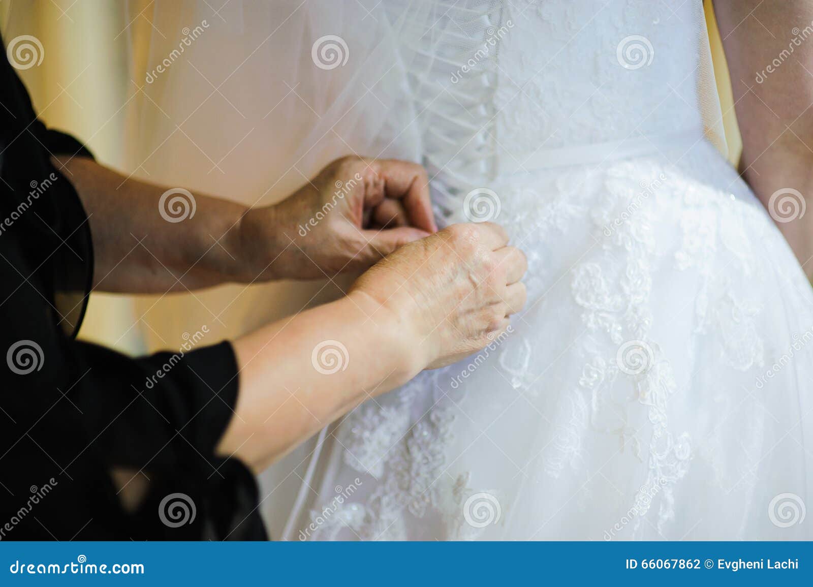 Bride Getting Dressed on Her Wedding Day Stock Photo - Image of ...