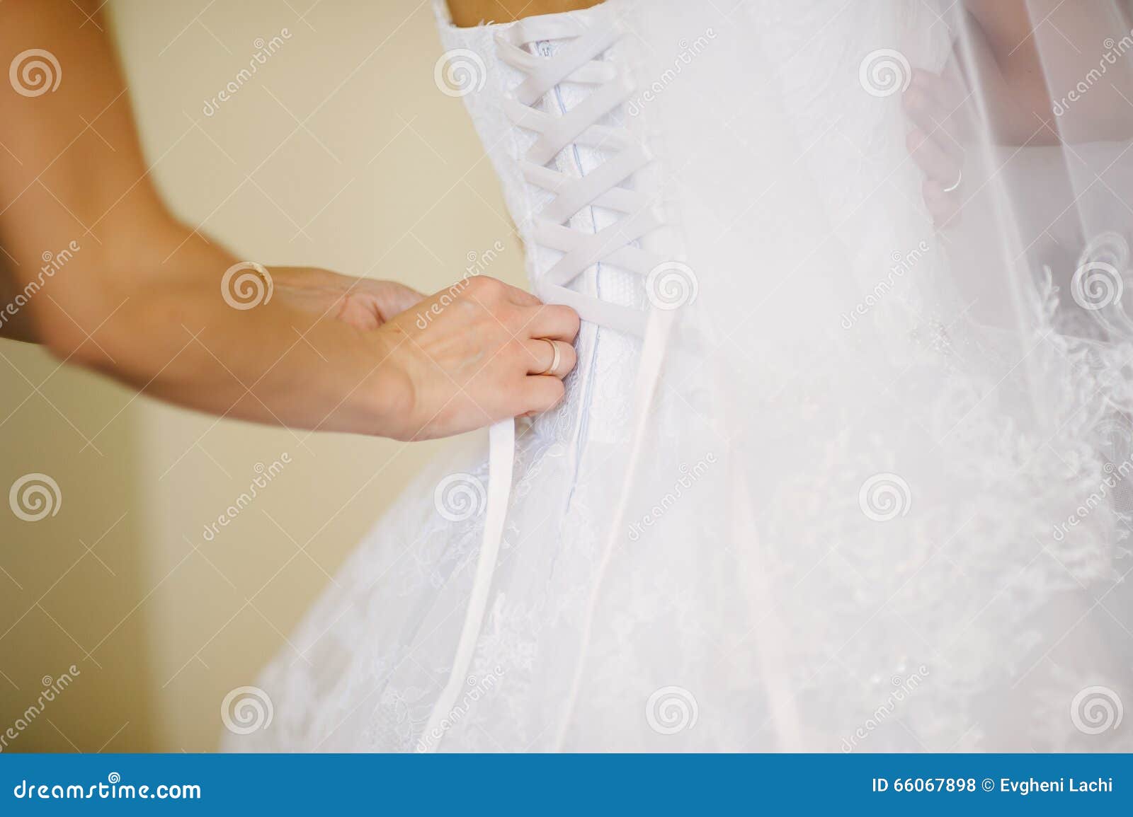 Bride Getting Dressed on Her Wedding Day Stock Photo - Image of female ...