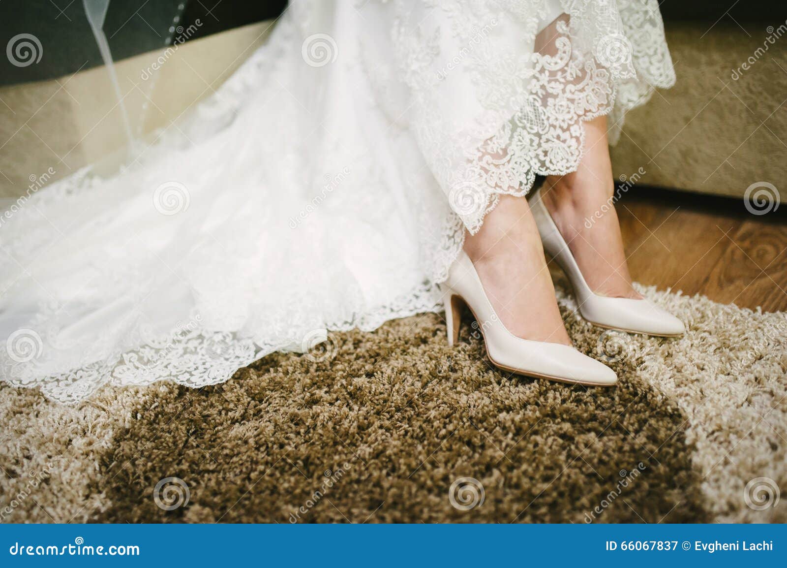 Bride Getting Dressed Shoes on Her Wedding Day Stock Image - Image of ...