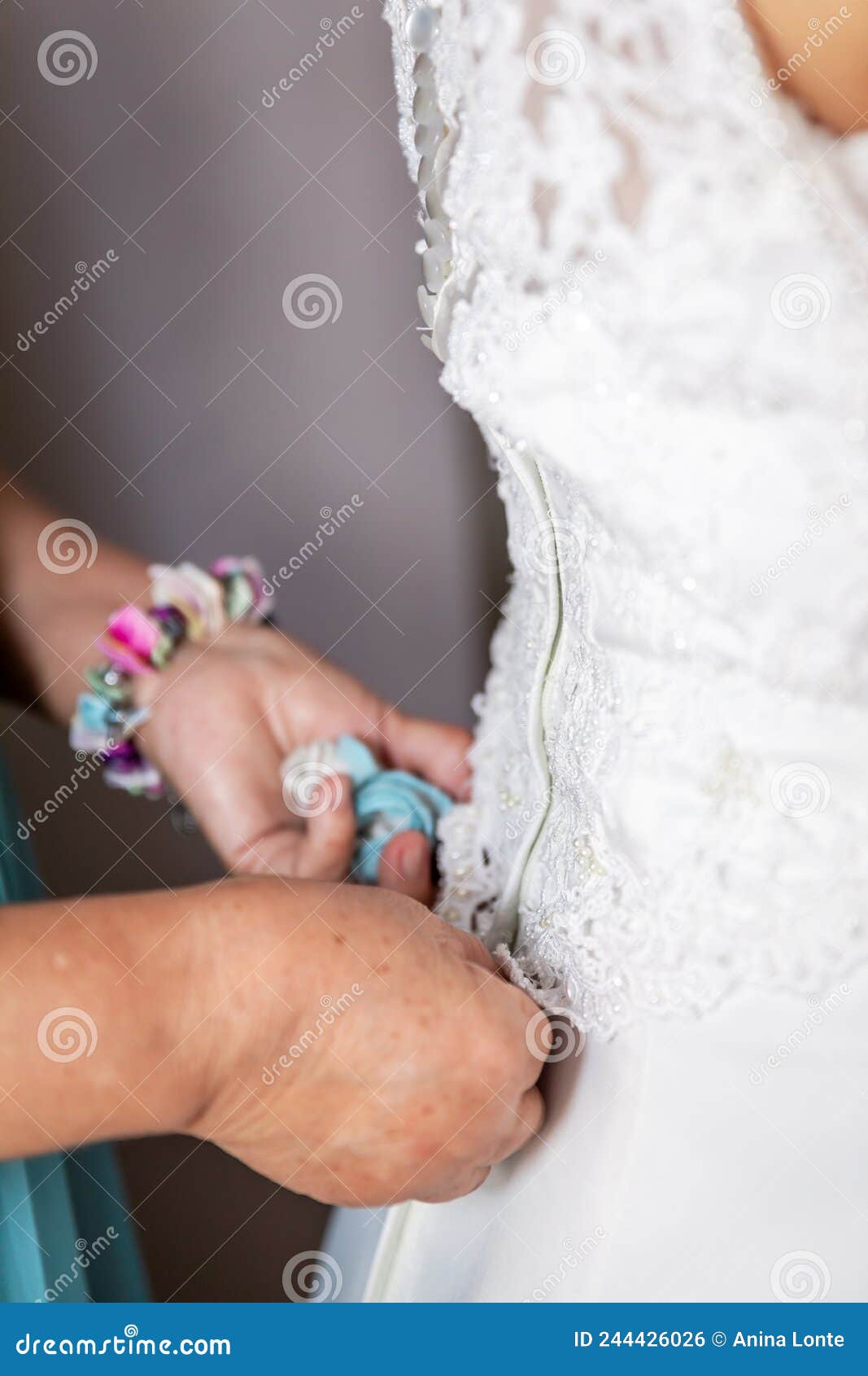 Bride Getting Ready, Dressing, on Her Wedding Day Stock Photo - Image ...