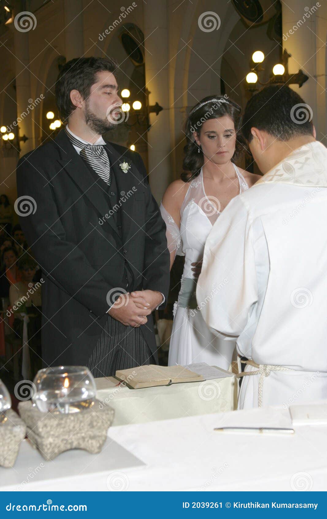 Bride and Groom at the Alter Stock Image - Image of casual, wedding ...