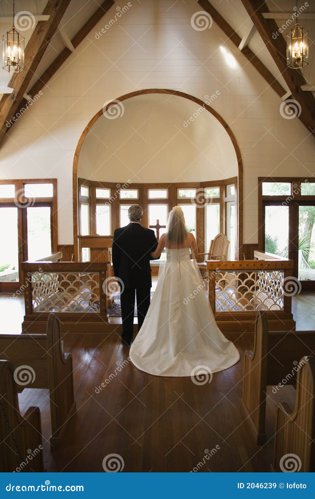 Bride and groom at alter. stock image. Image of color - 2046239