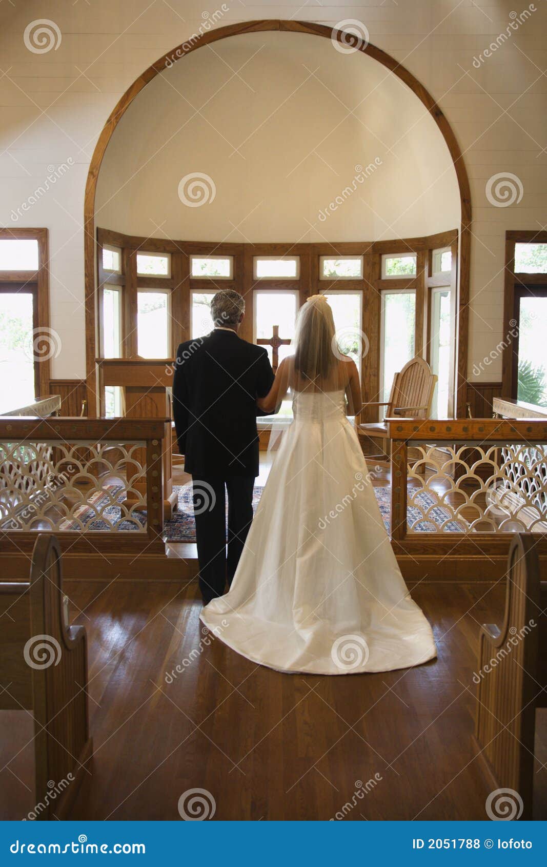 Bride and groom at alter. stock photo. Image of church - 2051788