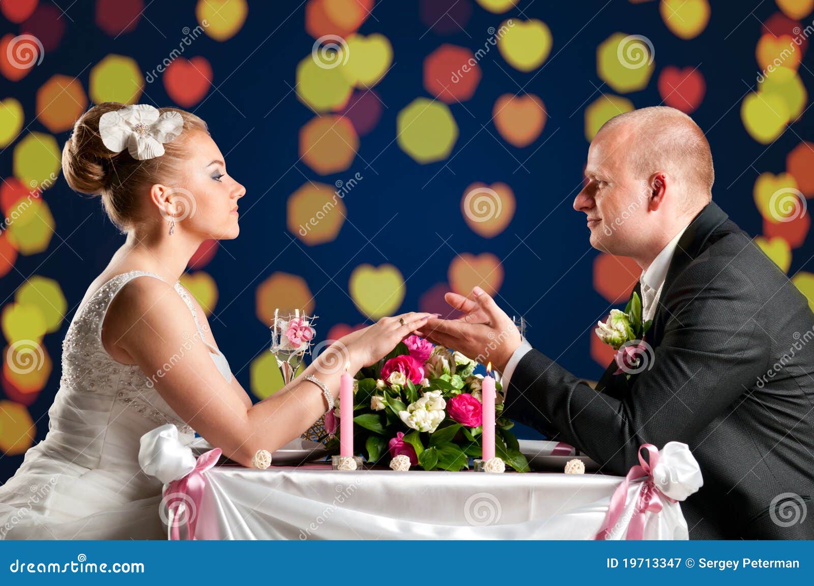 Bride and groom at cafe stock image. Image of candles - 19713347