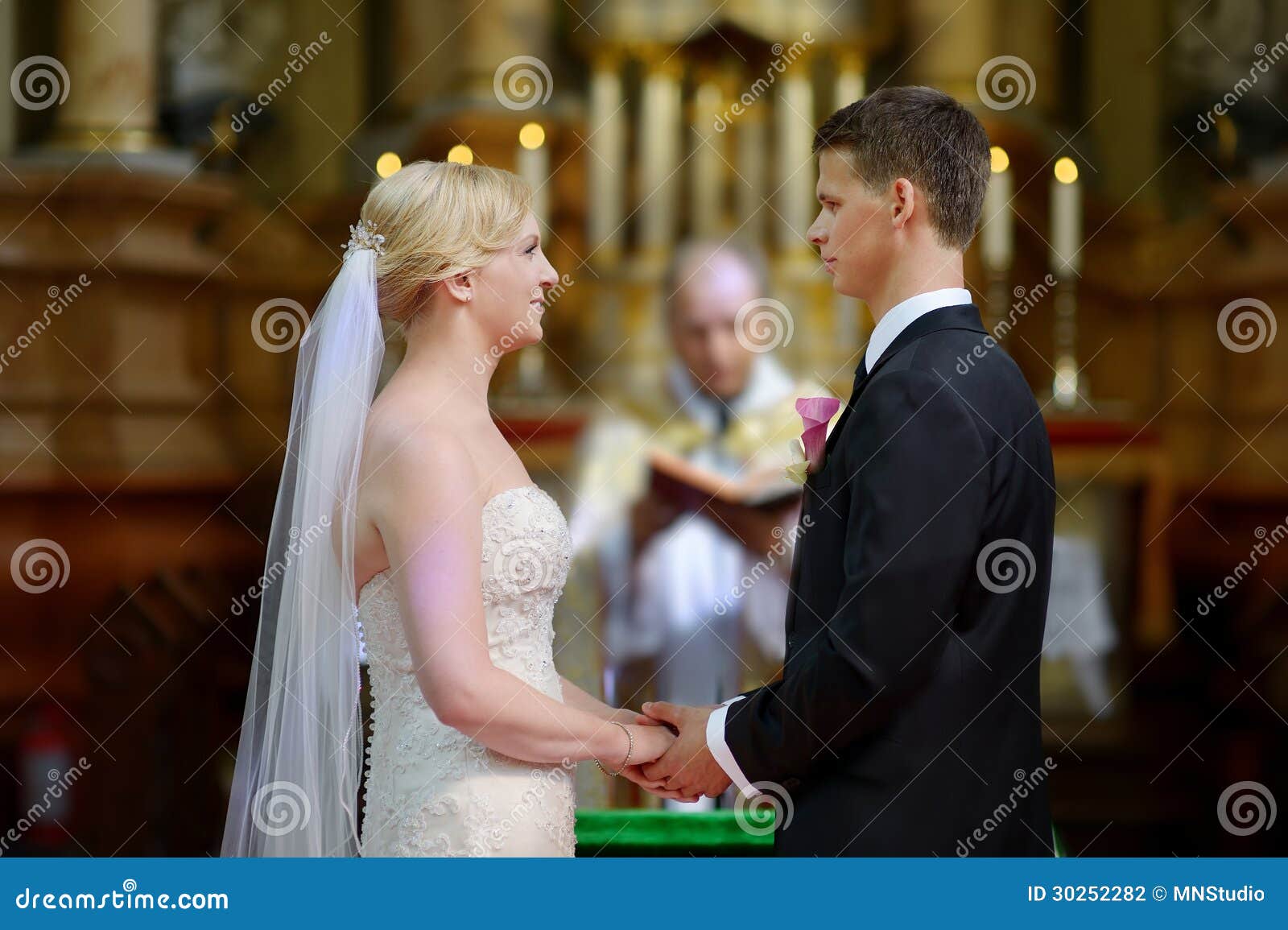 Bride and Groom at the Church Stock Photo - Image of elation, catholic ...