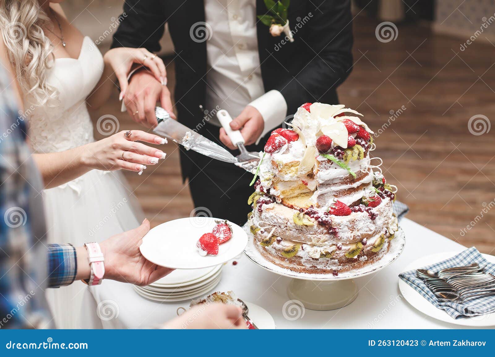 The Bride and Groom Cut the Wedding Cake. Stock Image - Image of ...