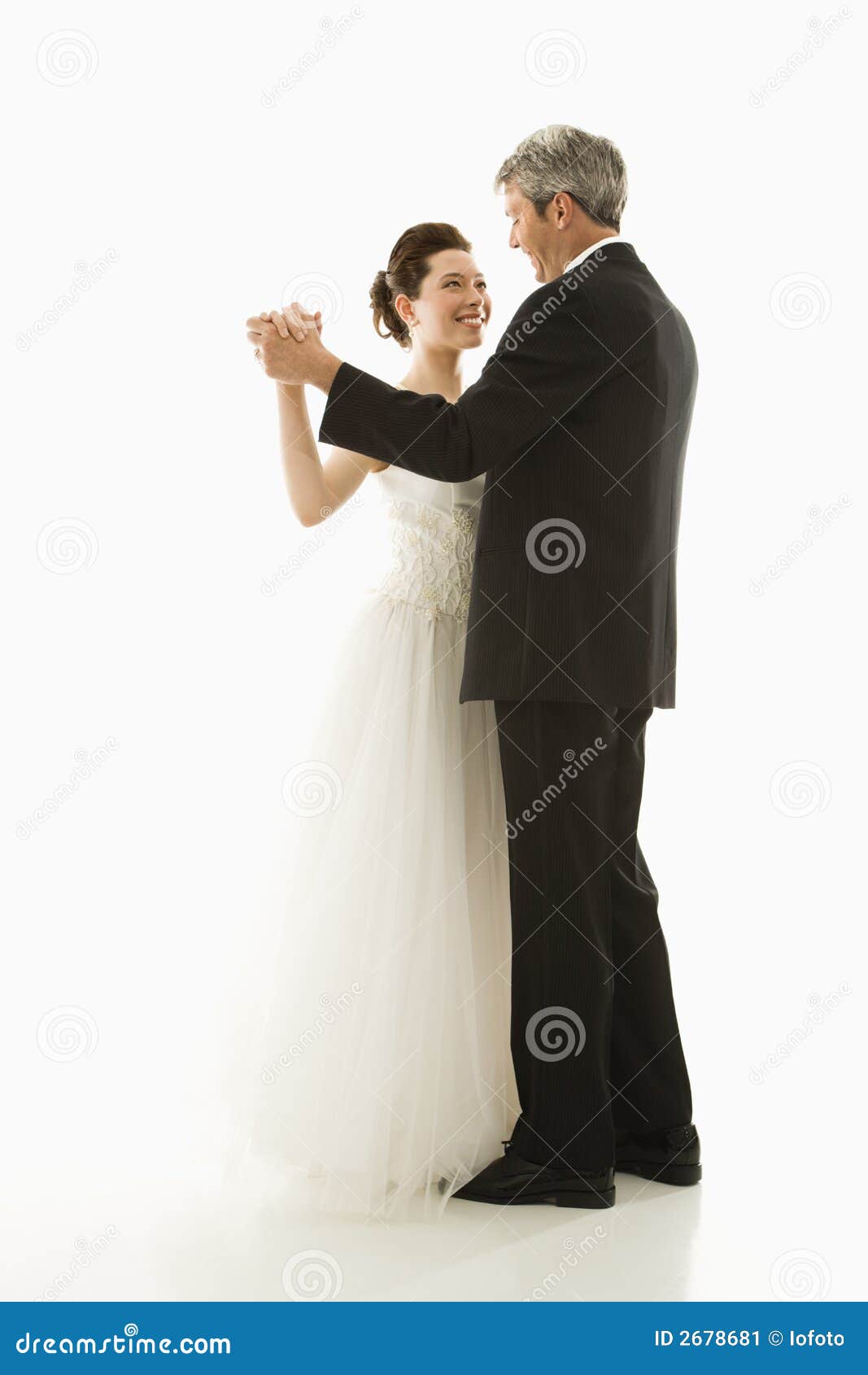 Bride and groom dancing. stock image. Image of indoors - 2678681