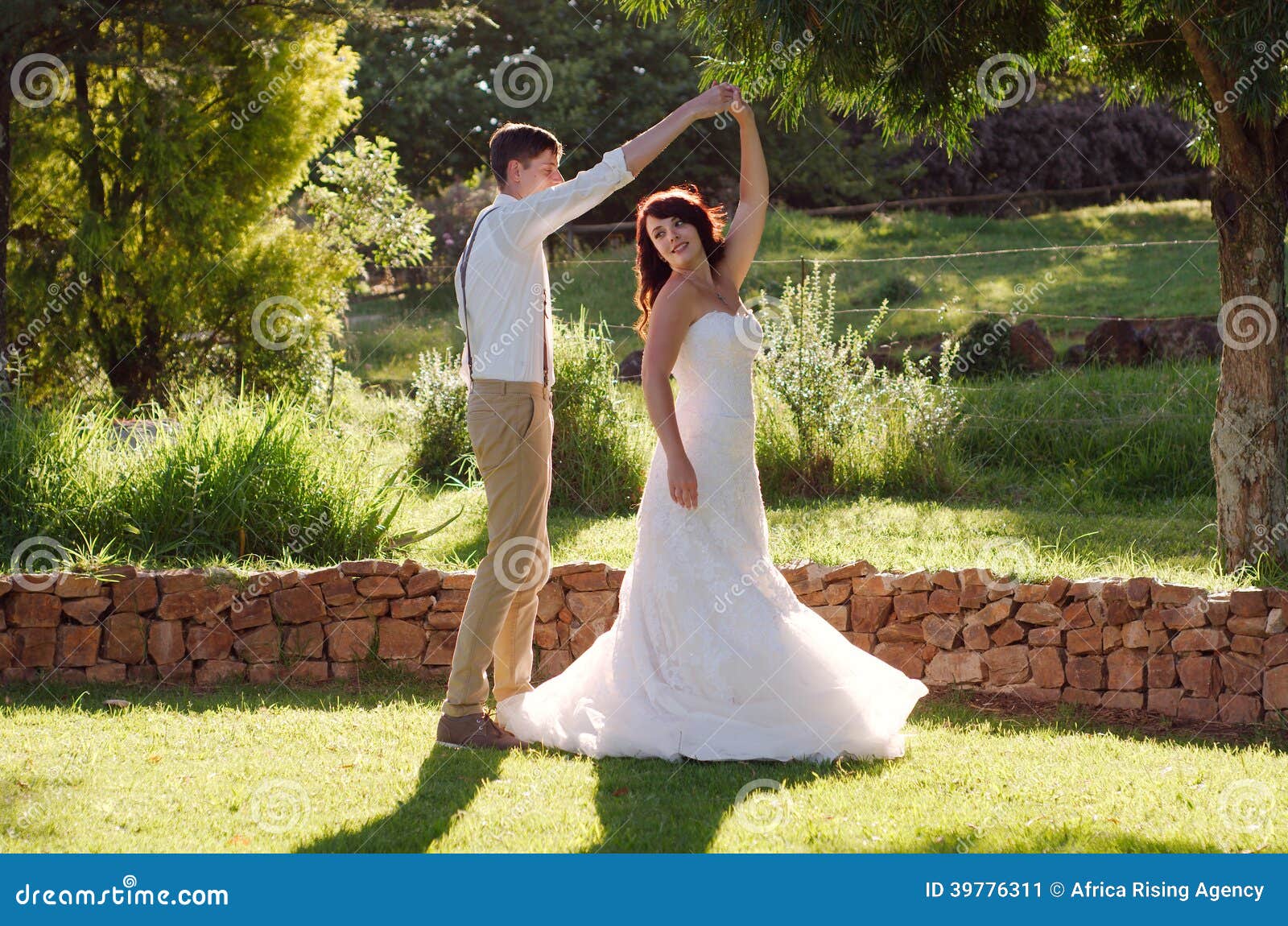Bride and Groom Dancing in Garden Wedding Stock Image - Image of ...