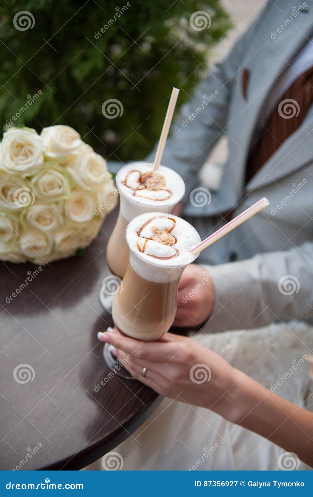 Bride and Groom Drink Latte with Painted Hearts Stock Image - Image of ...