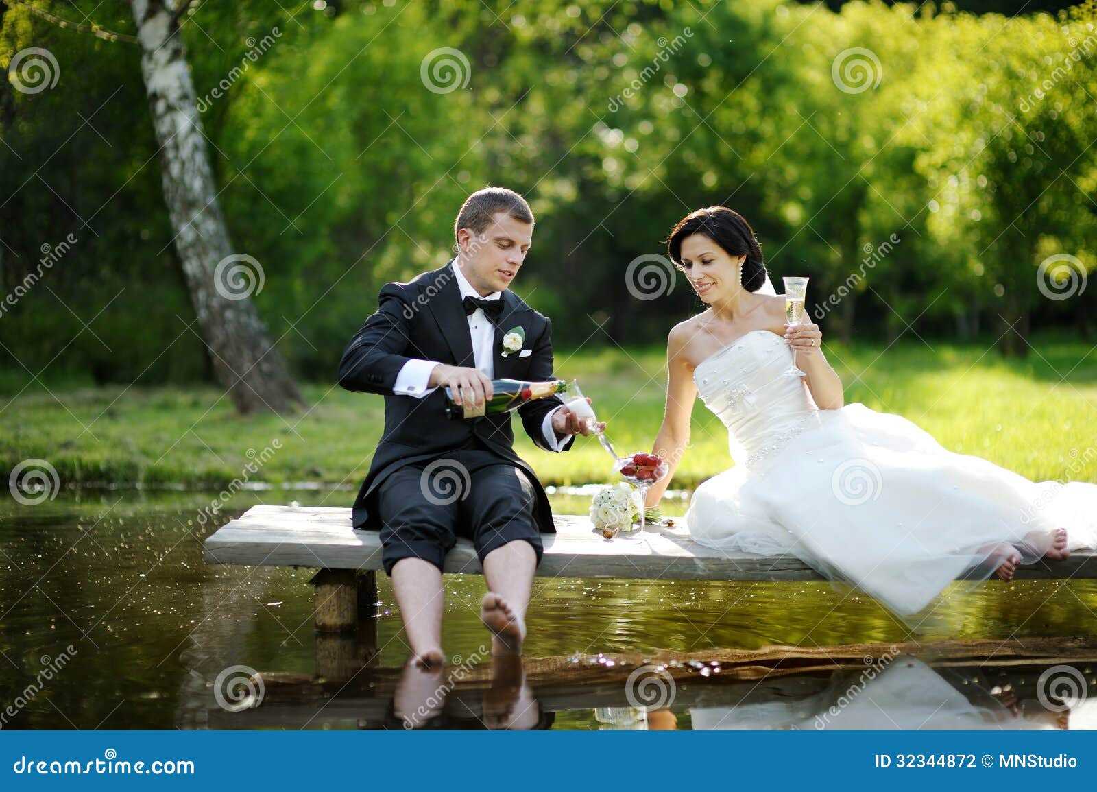 Bride and Groom Drinking Champagne Stock Photo - Image of cheerful ...