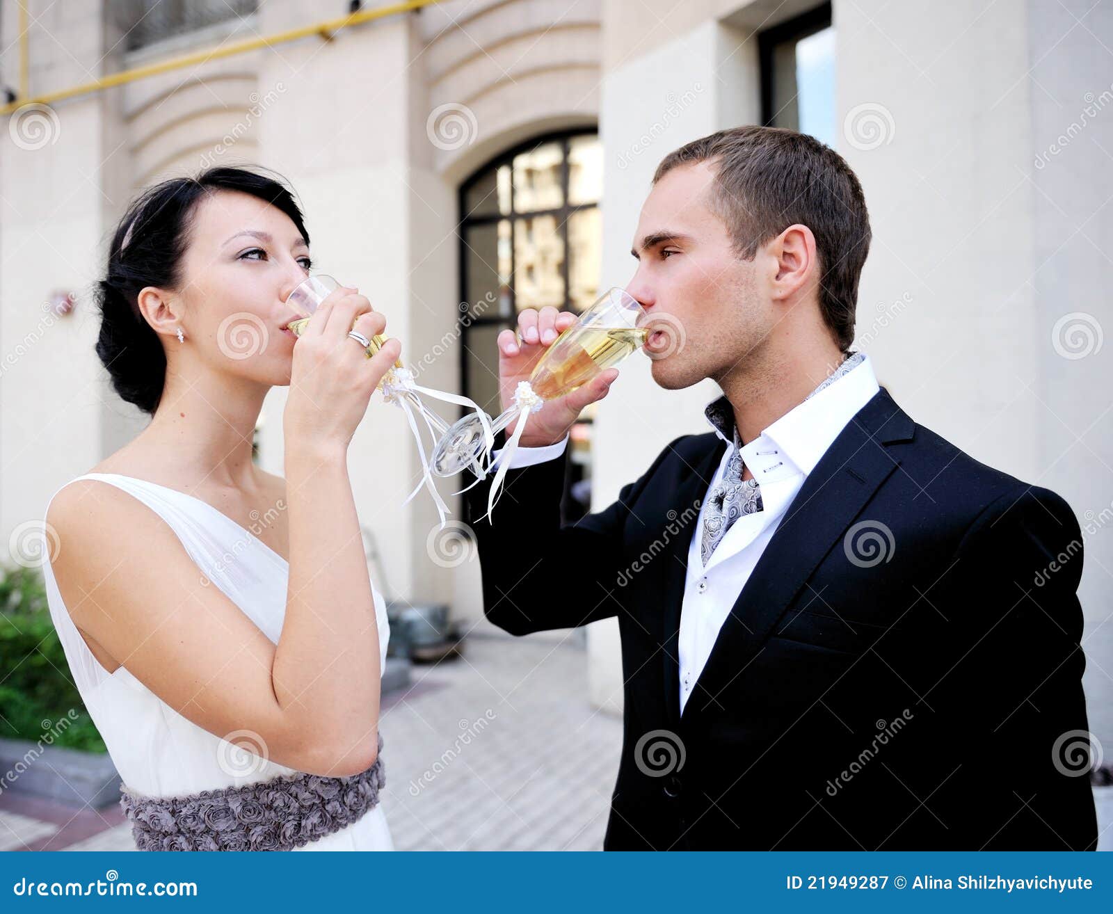 Bride and Groom Drinking Champagne Outdoors Stock Image - Image of ...