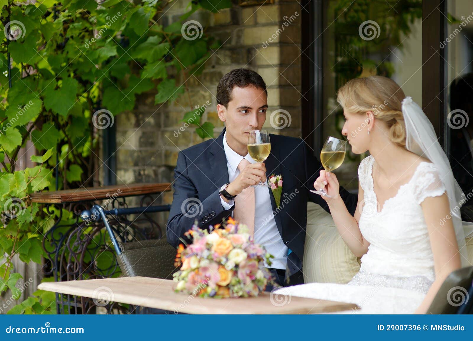 Bride and Groom Drinking Wine Stock Photo - Image of cafe, marriage ...