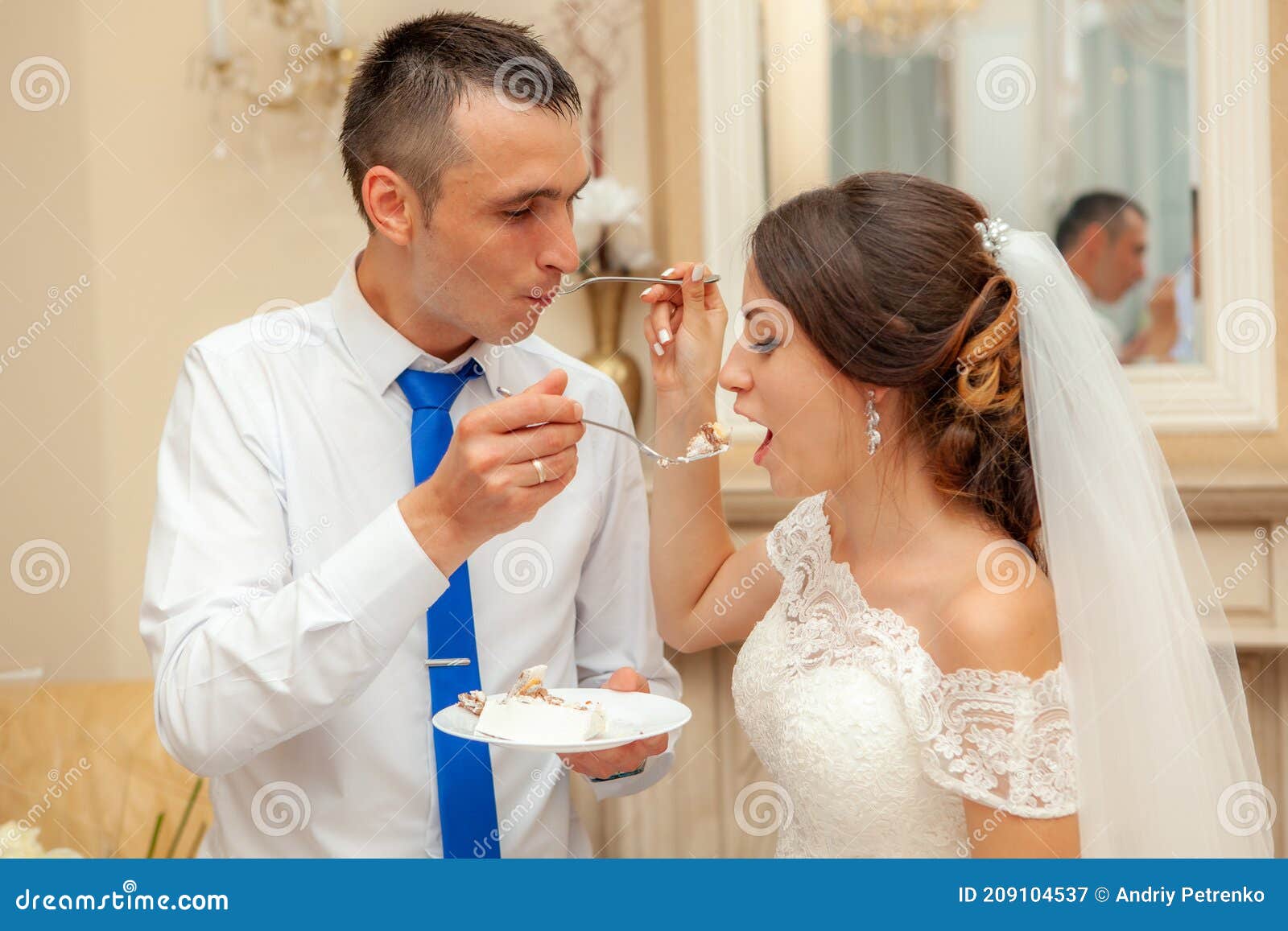 Bride and Groom Eat Wedding Cake Stock Image - Image of married, male ...