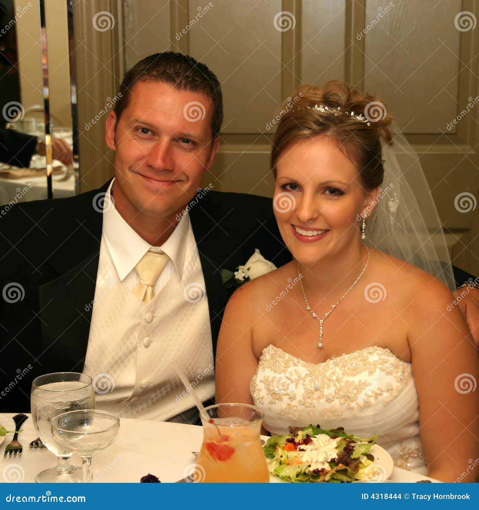 Bride and groom eating stock photo. Image of dress, reception - 4318444