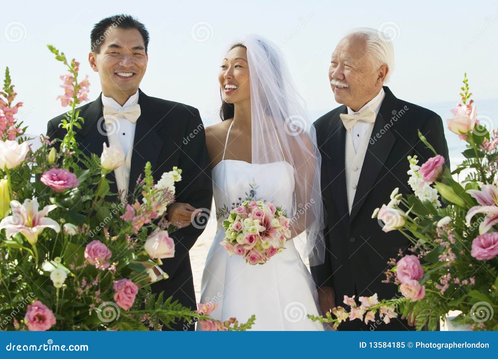 Bride and Groom with Father Stock Image - Image of flowers, rose: 13584185