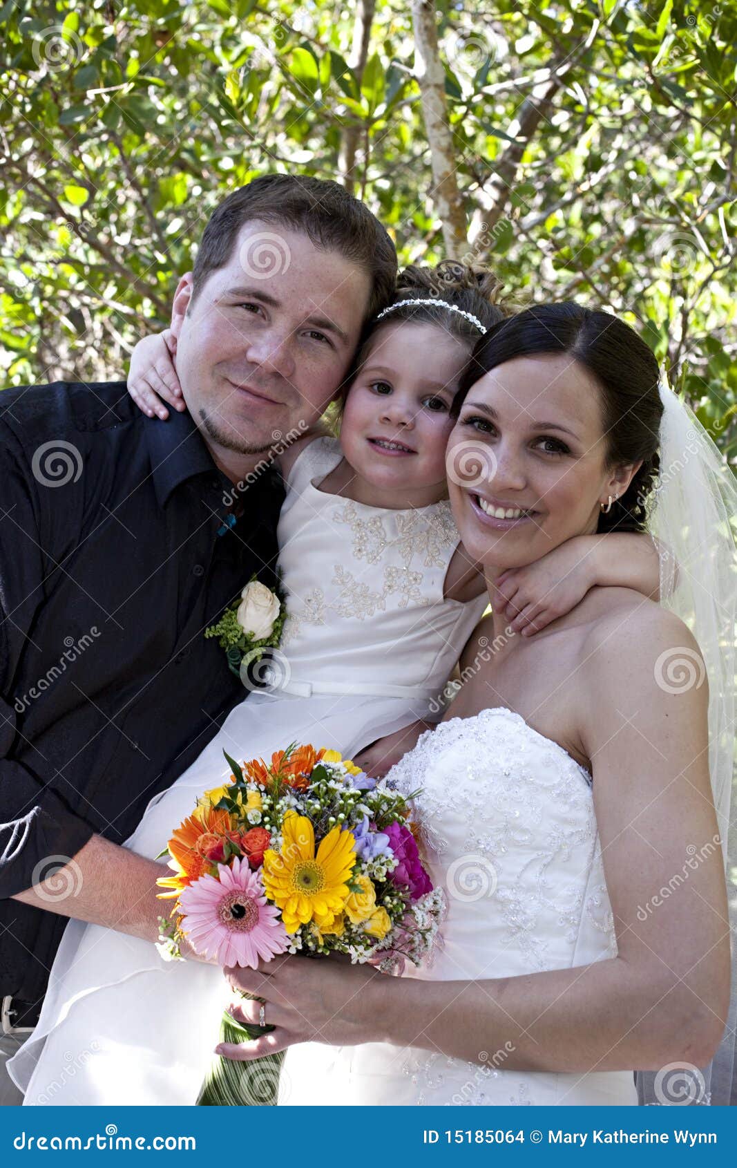 Bride and Groom with Flower Girl Stock Photo - Image of happy, groom ...