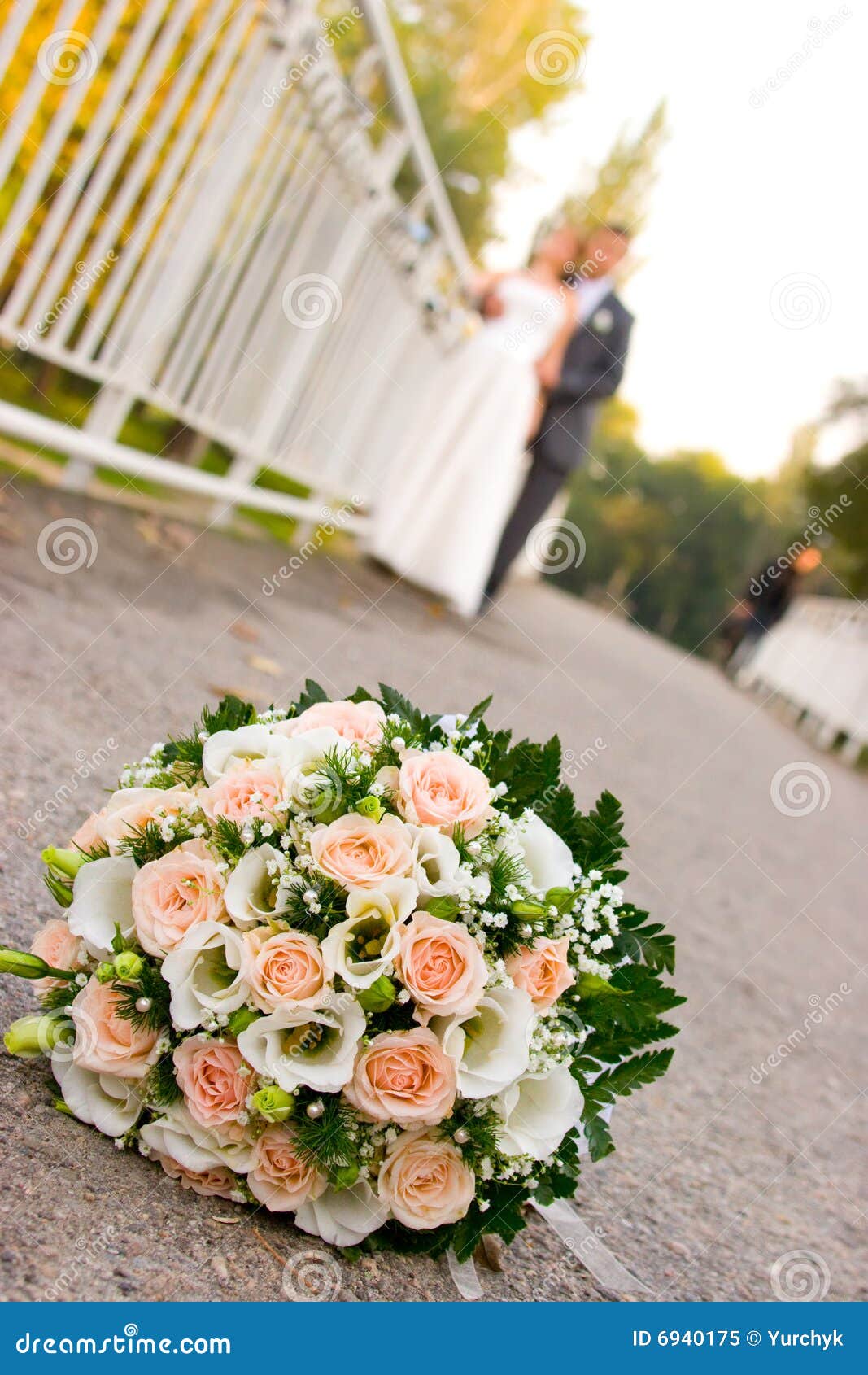 Bride and Groom with Flowers in Front Stock Image - Image of happiness ...