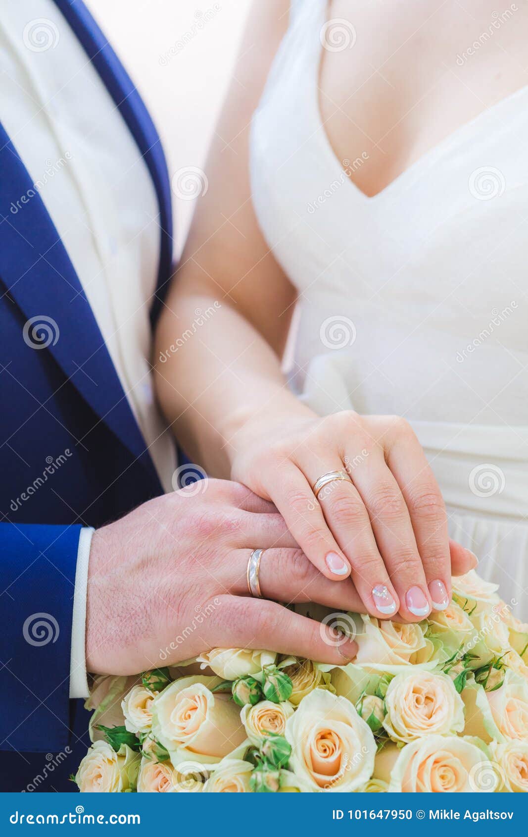 Bride and Groom Hands and Rings on Wedding Bouquet Stock Photo - Image ...