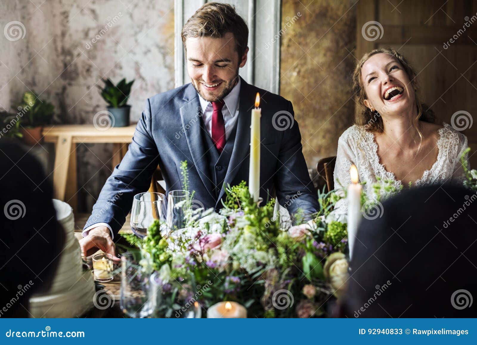 Bride and Groom Having Meal with Friends at Wedding Reception Stock ...