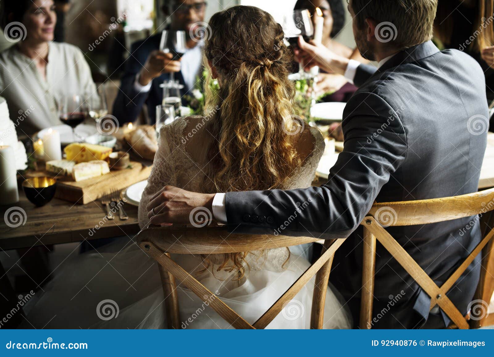 Bride and Groom Having Meal with Friends at Wedding Reception Stock ...