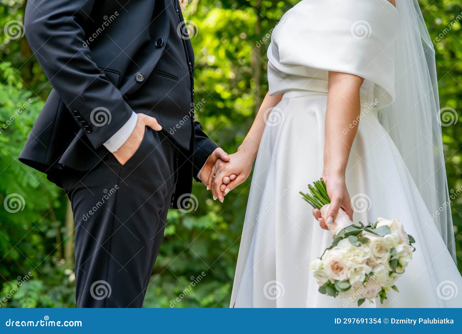 The Bride and Groom are Holding Hands, without Faces Stock Photo ...