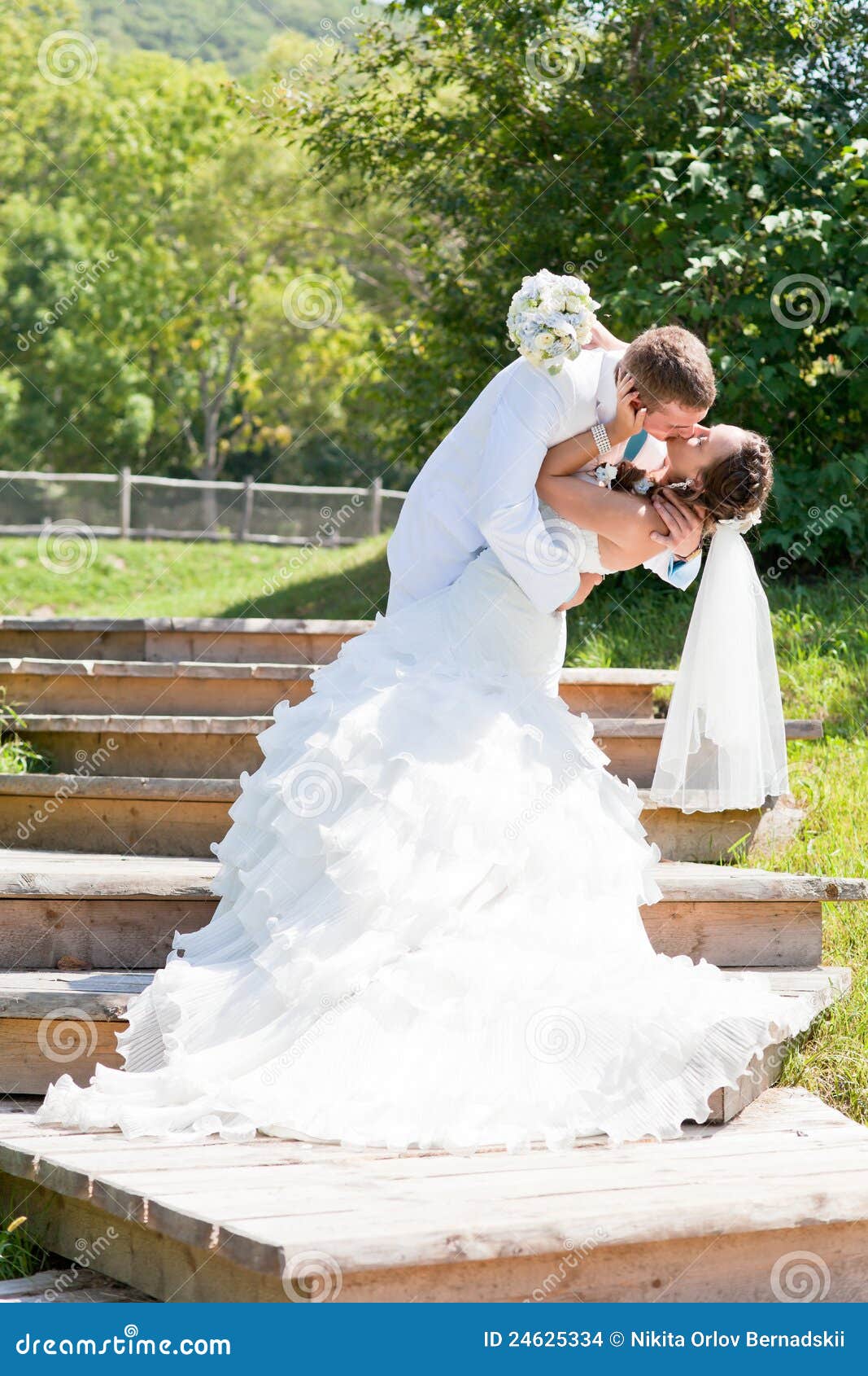 Bride and groom kissing stock photo. Image of couple - 24625334