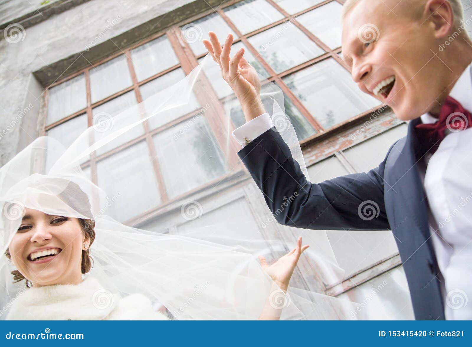 Bride and groom laugh stock photo. Image of forever - 153415420