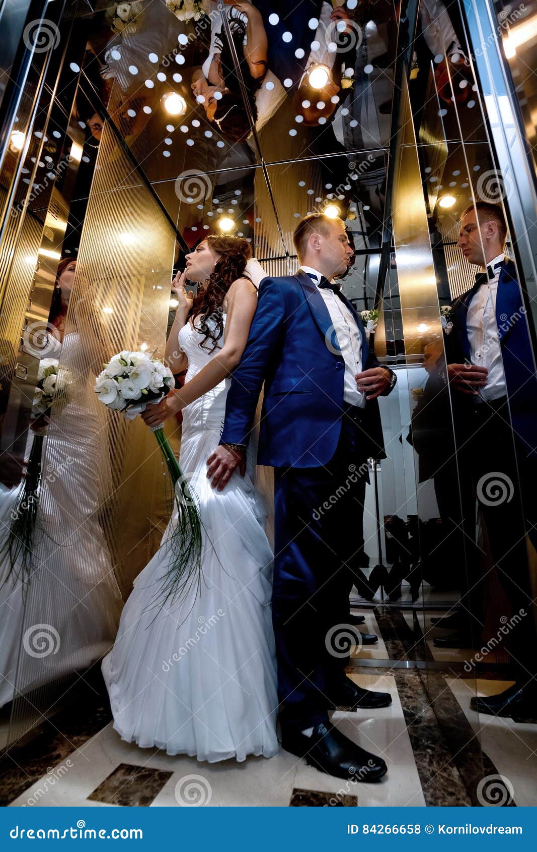 Bride and groom in lift stock photo. Image of lift, handsome - 84266658