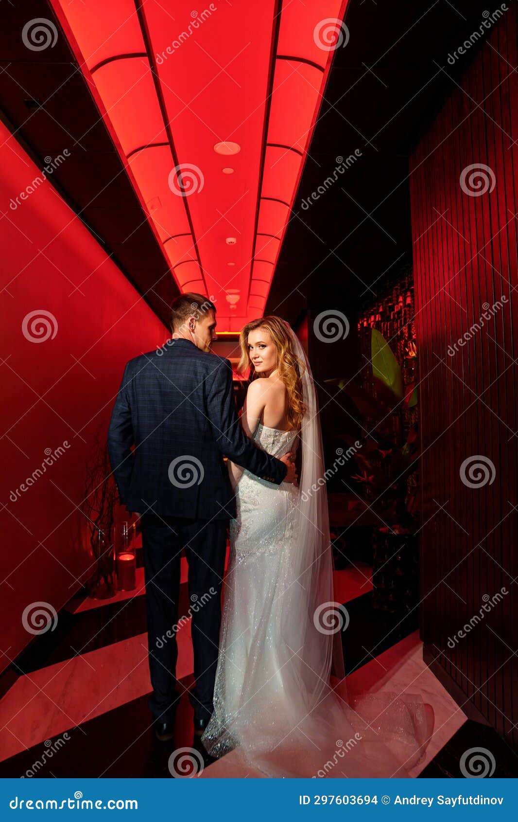 Bride and Groom in a Long Red Corridor. Stock Photo - Image of event ...