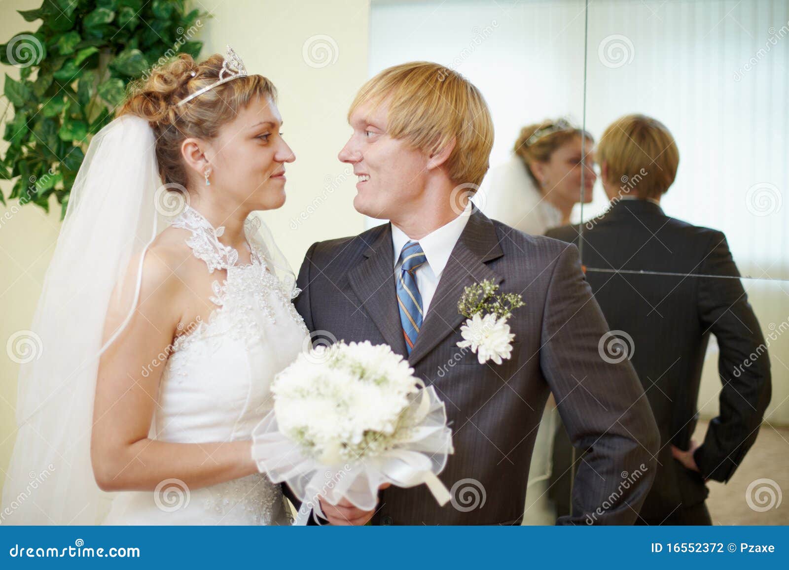 Bride and Groom Looking at Each Other Stock Photo - Image of female ...