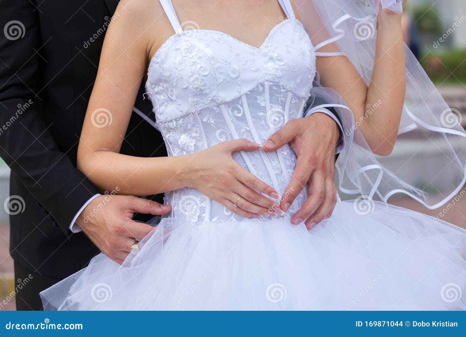 Bride and Groom Make Heart Sign with Hands Stock Photo - Image of cute ...