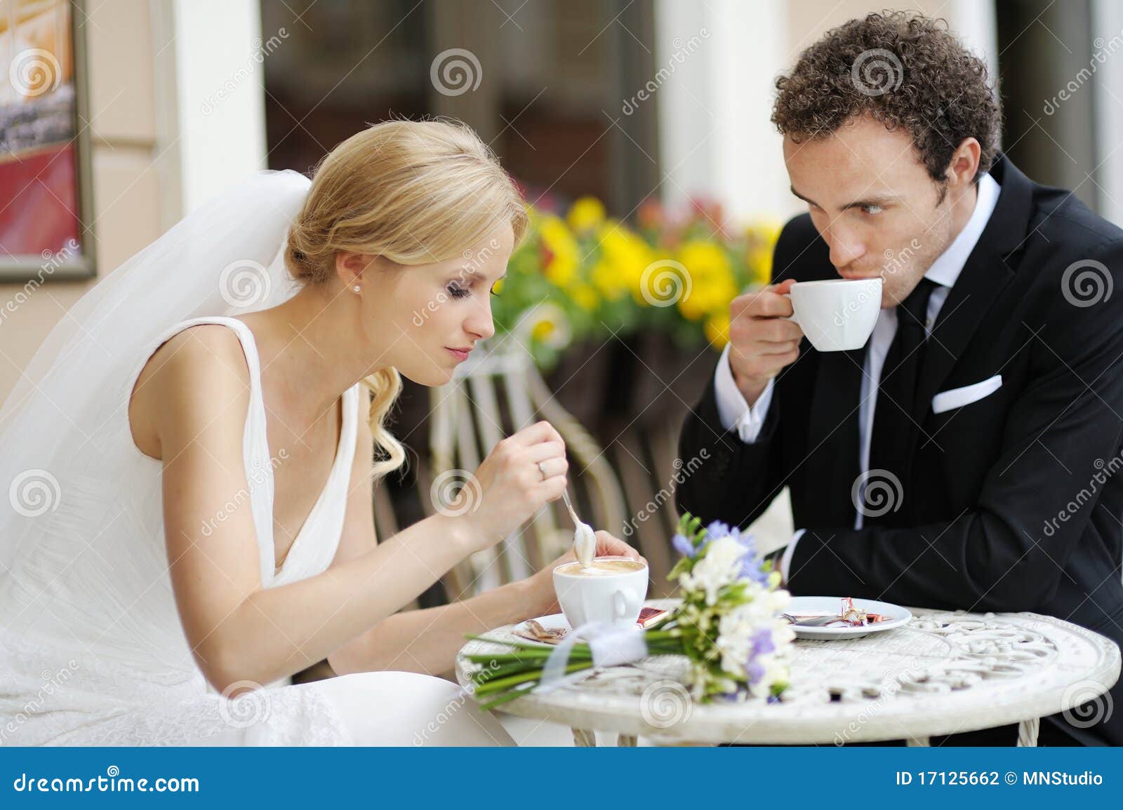 Bride and Groom at Outdoor Cafe Stock Photo - Image of looking, eating ...