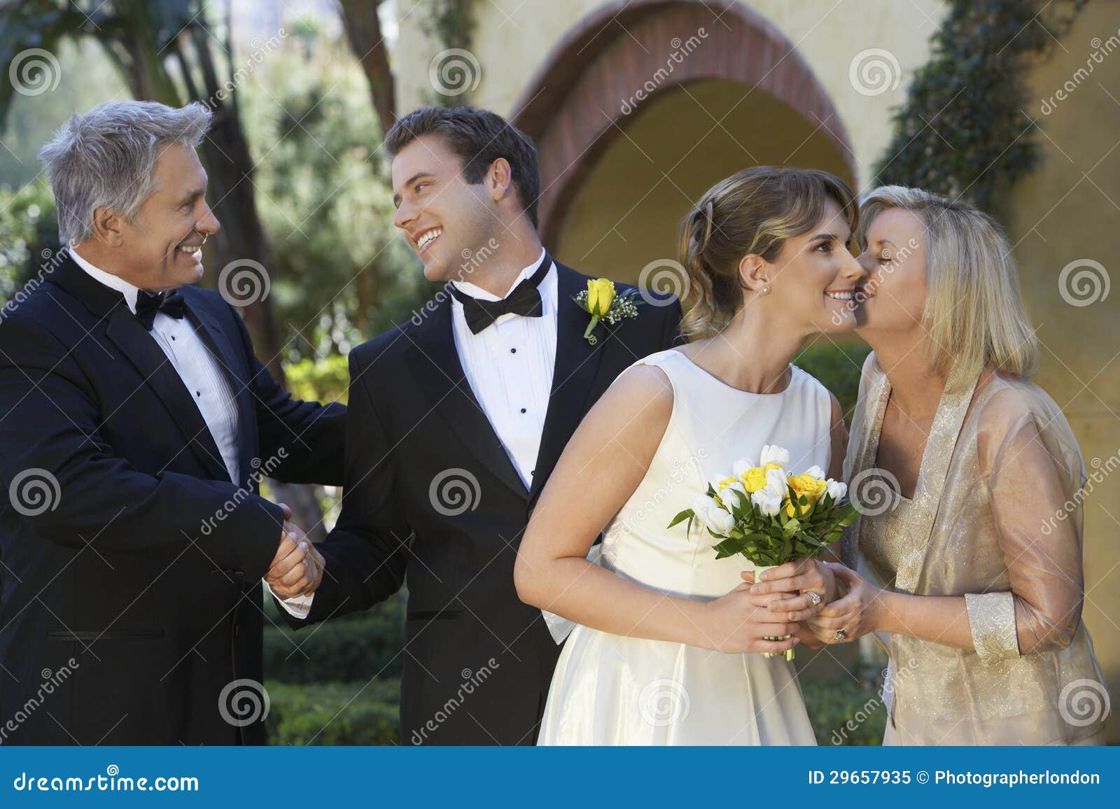 Bride and Groom with Parents Stock Image - Image of caucasian, looking ...