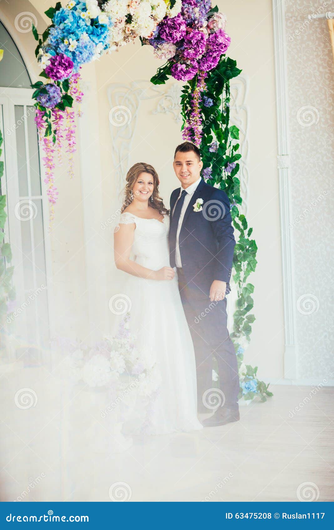 Bride and Groom Posing in a Hotel Room Stock Photo - Image of couple ...
