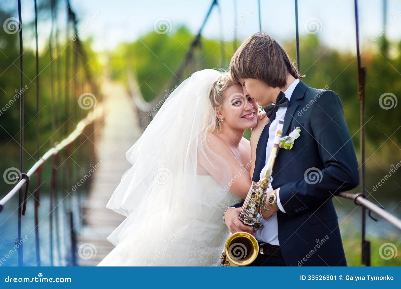Bride and groom with sax stock image. Image of direction - 33526301