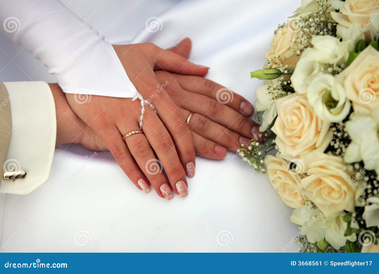 Bride and Groom Showing Wedding Rings Stock Image - Image of flowers ...