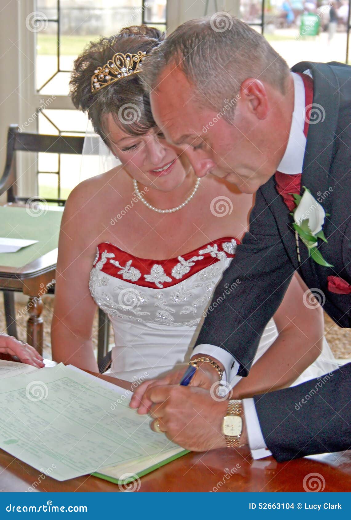 Bride and Groom Signing the Register Stock Photo - Image of message ...
