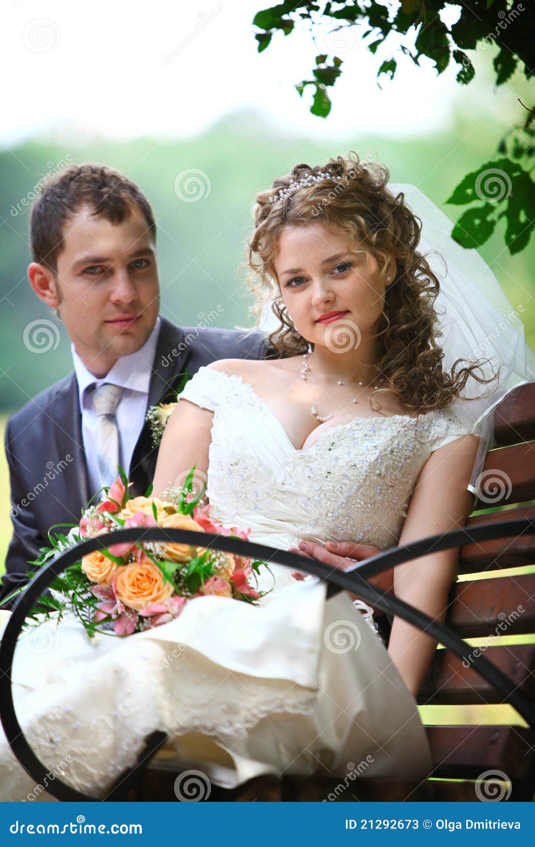 Bride and Groom Sitting on the Bench Stock Image - Image of dress ...