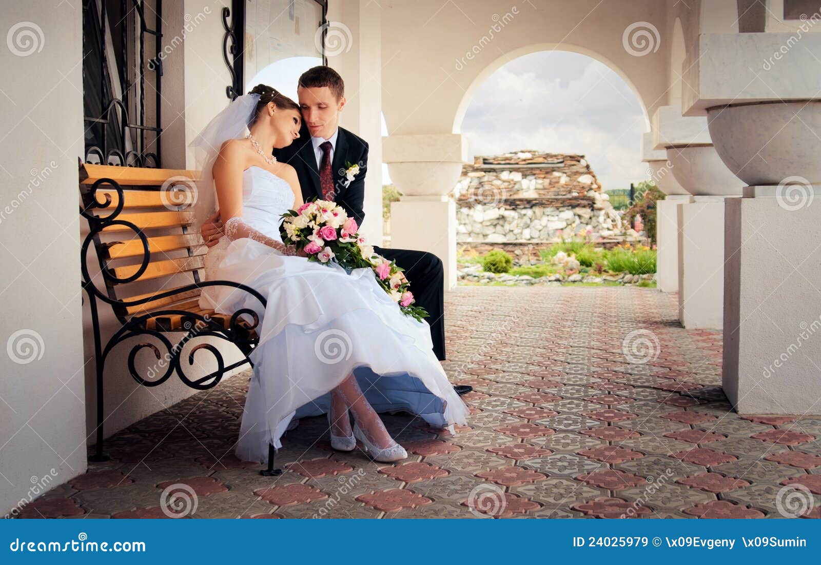 The Bride and Groom Sitting on a Bench Stock Image - Image of marriage ...