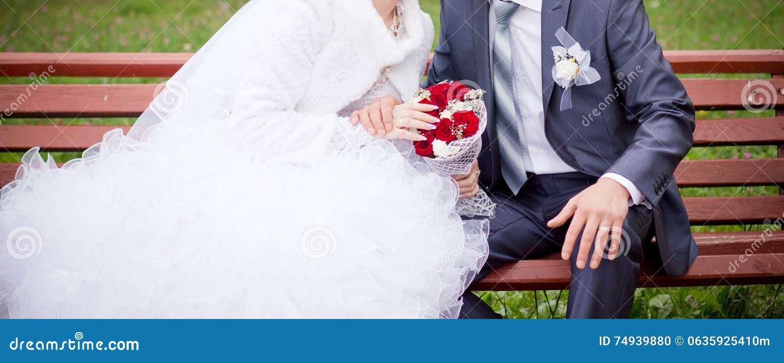 Bride and Groom Sitting on a Bench in a Park Stock Photo - Image of ...