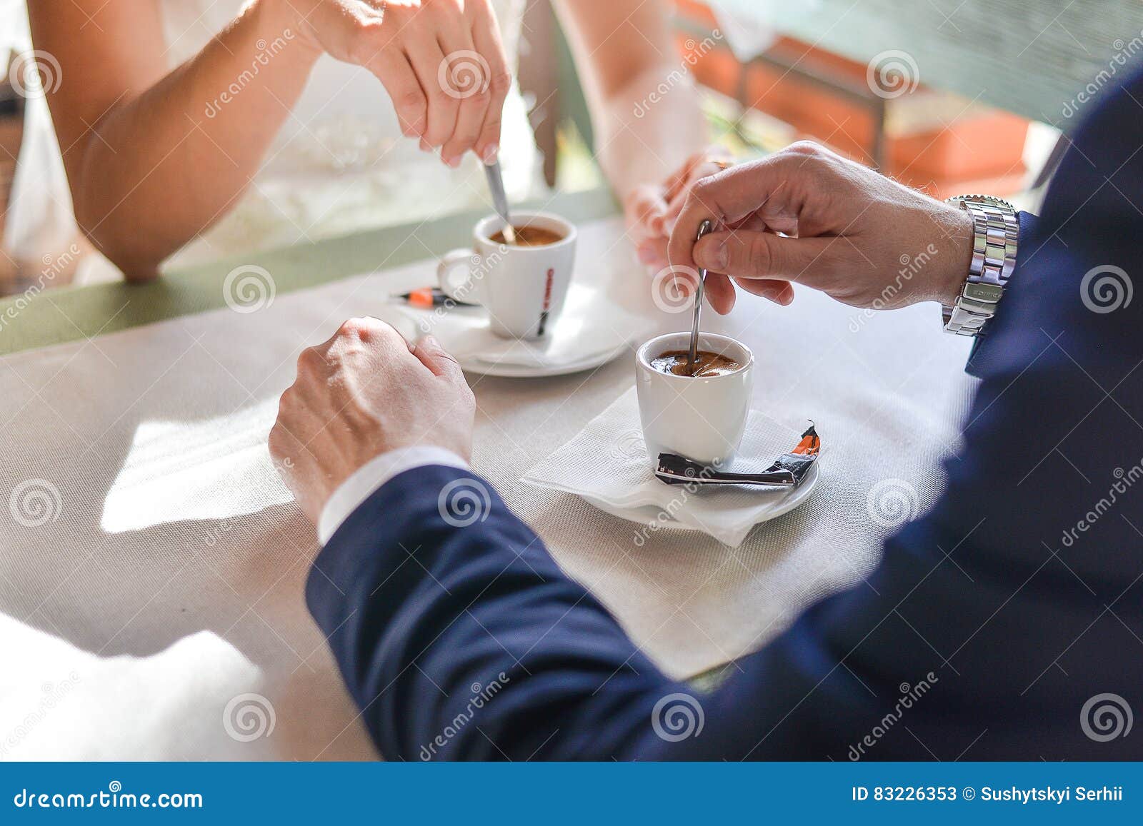 Bride and Groom Sitting in the Cafe at the Table. Stock Image - Image ...