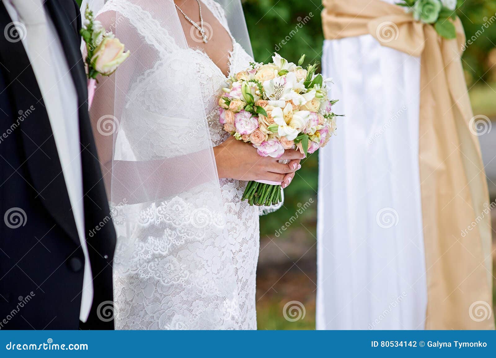 Bride and Groom Stand Under the Arch at the Wedding Ceremony Stock ...