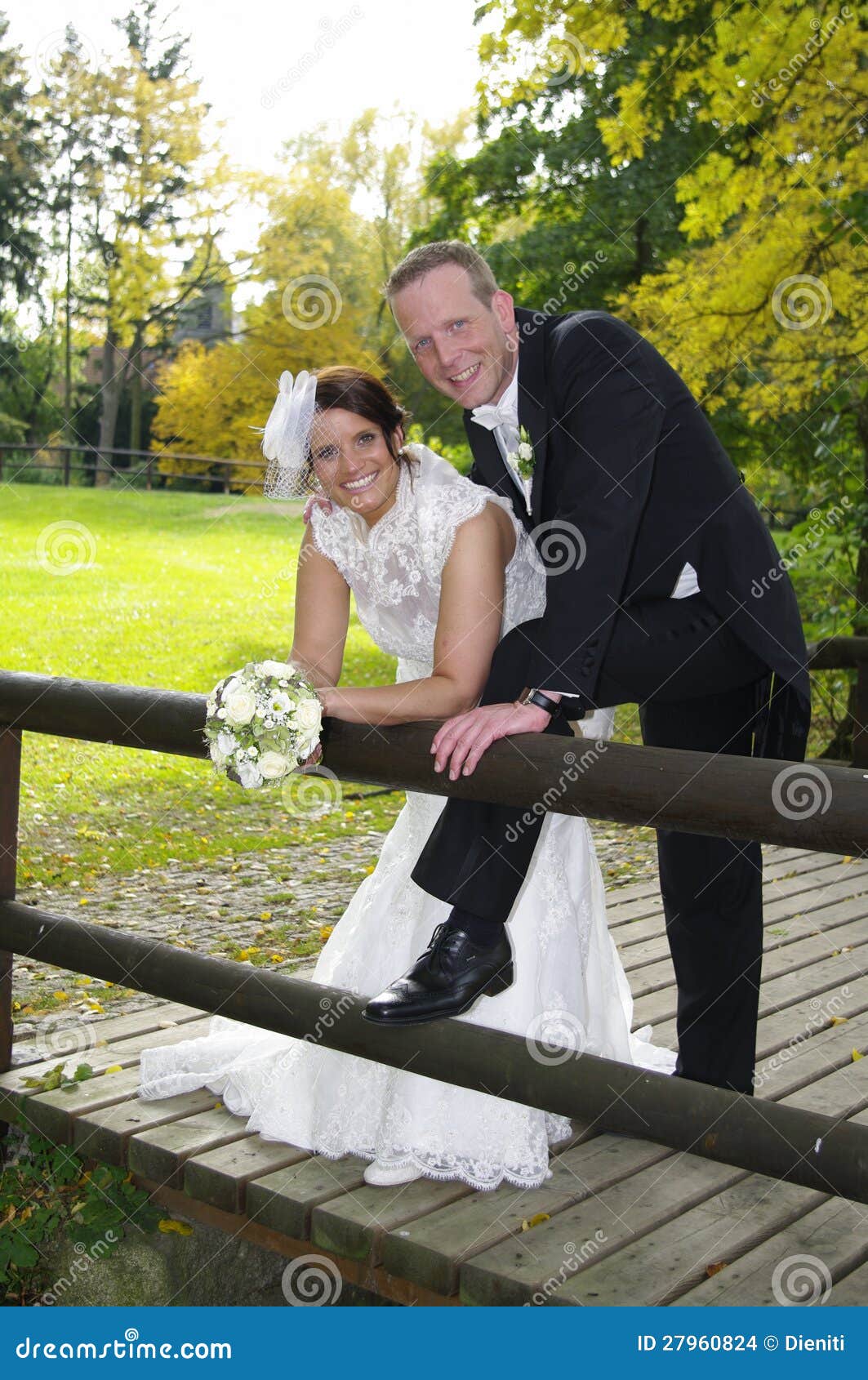 Bride and Groom on a Timber Bridge in Autumn Stock Photo - Image of ...