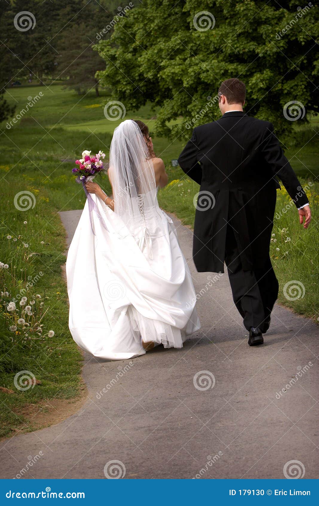 Bride and Groom Walking Away Stock Photo - Image of floral, couples: 179130