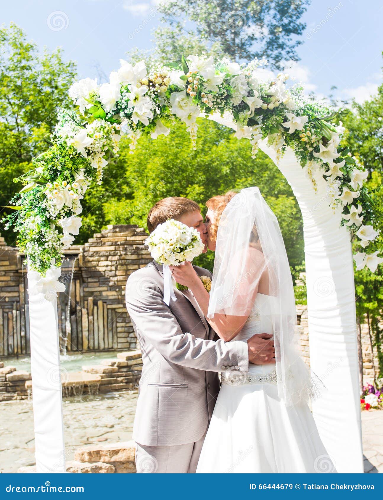 Bride and Groom at Wedding Ceremony Stock Image - Image of floral ...