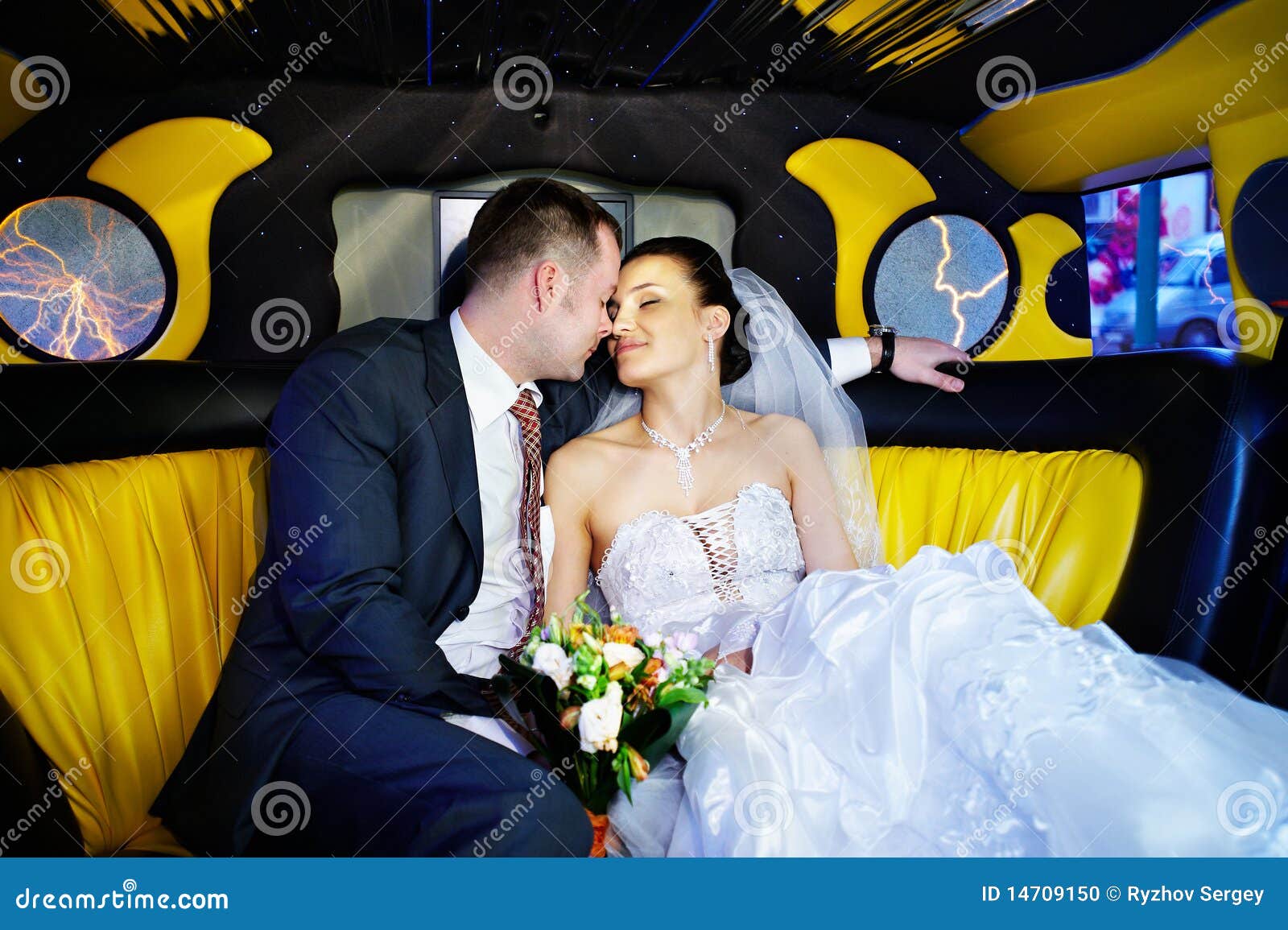 The Bride and Groom in a Wedding Limousine Stock Photo - Image of ...